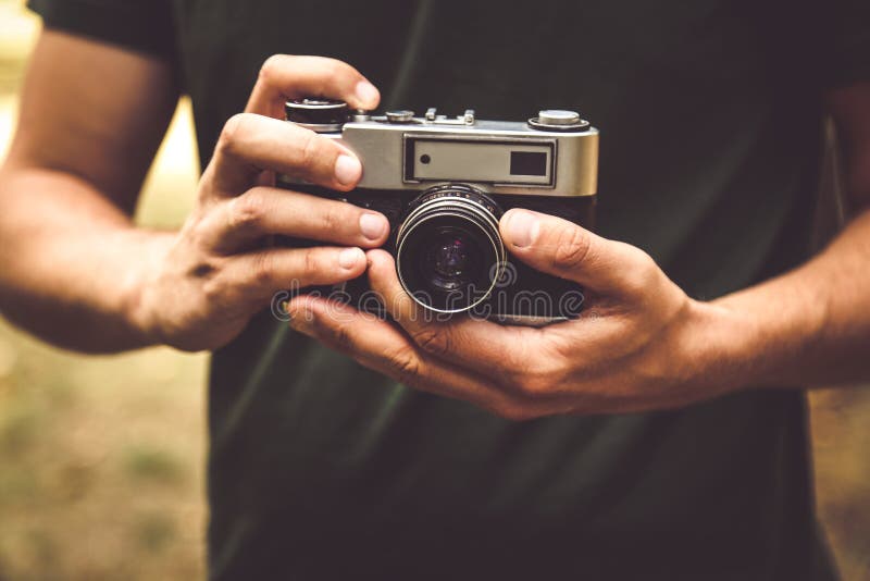 Man with Old Camera in a Hand. Stock Image - Image of handsome, elderly ...