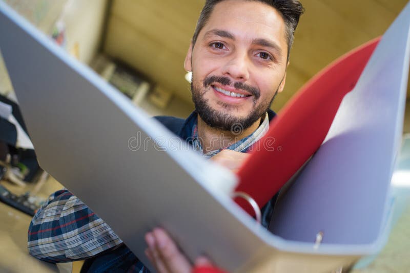 Man and open file folder stock photo. Image of list - 245447648