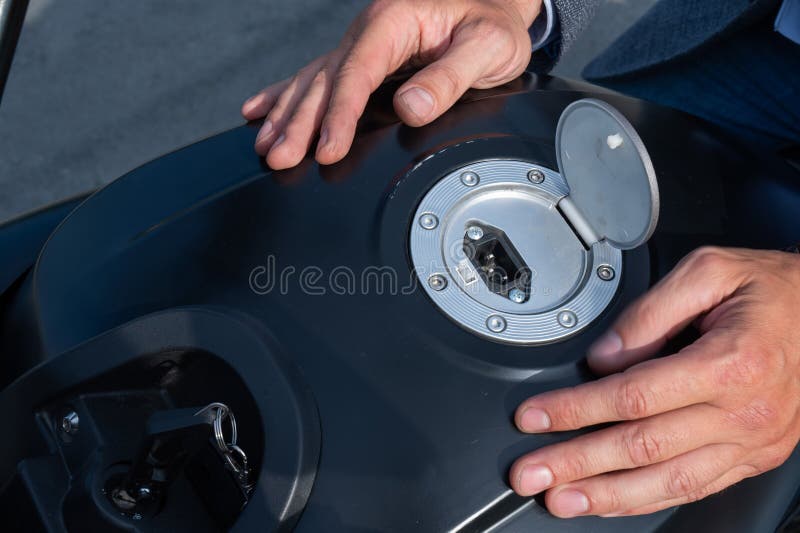 Man Opened Charging Socket Electric Motorcycle Stock Photos - Free ...