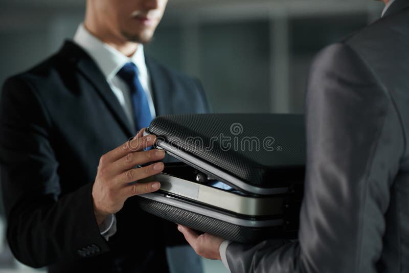 Man Opening Briefcase stock photo. Image of secret, corruption - 251964108