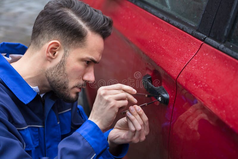 Man Opening Car Door with Lockpicker Stock Image - Image of locksmith ...