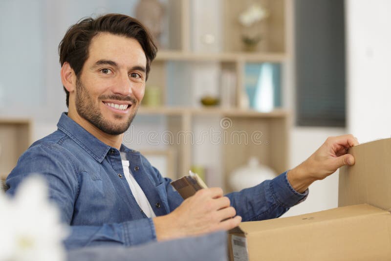 1,422 Man Opening Shipping Box Stock Photos - Free & Royalty-Free Stock ...