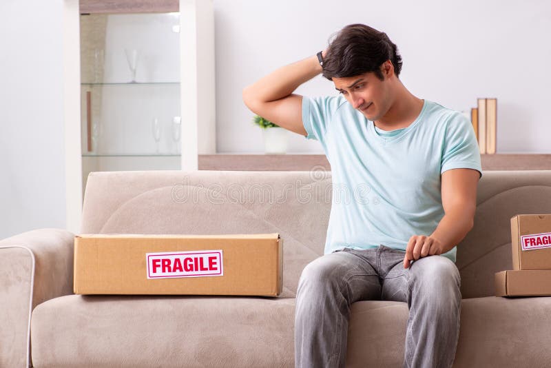 The Man Opening Fragile Parcel Ordered from Internet Stock Image ...