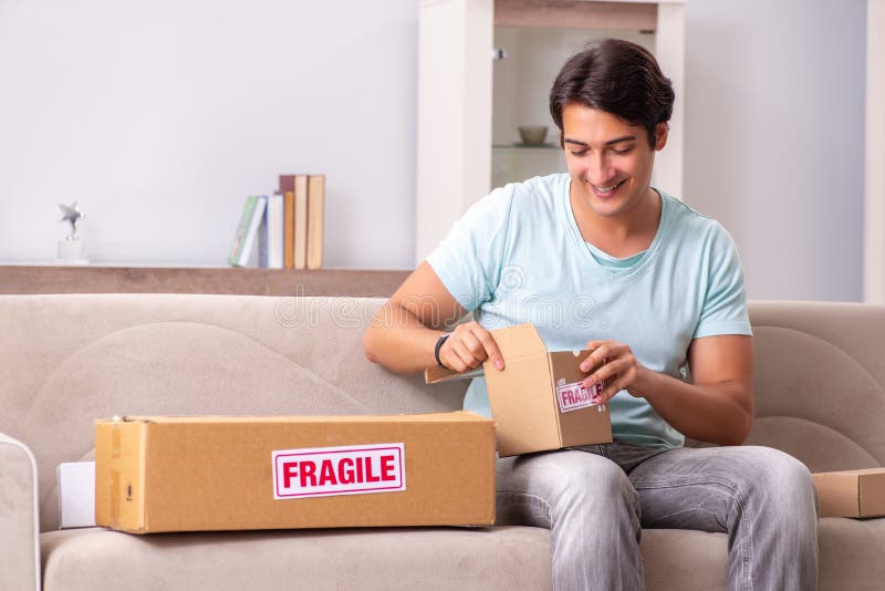 The Man Opening Fragile Parcel Ordered from Internet Stock Image ...