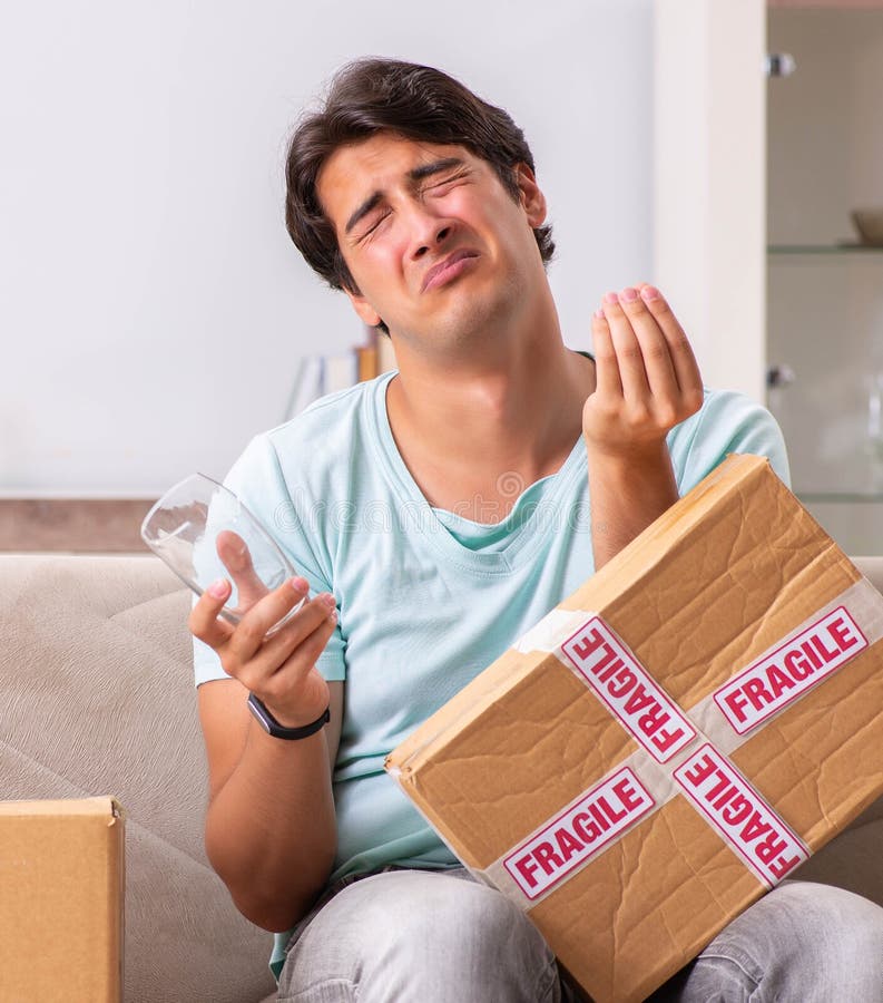 Man Opening Fragile Parcel Ordered from Internet Stock Image - Image of ...