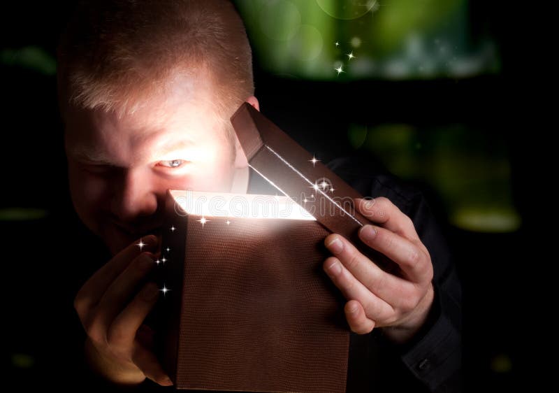 Man Opening a Gift Box stock image. Image of face, expression - 26430839