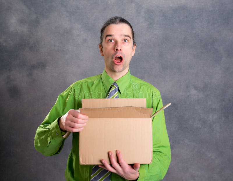 Man opening a package stock image. Image of handsome - 68526115