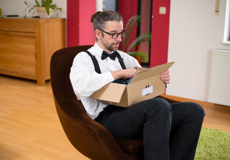 Man opening a package stock image. Image of package, shipment - 68878043