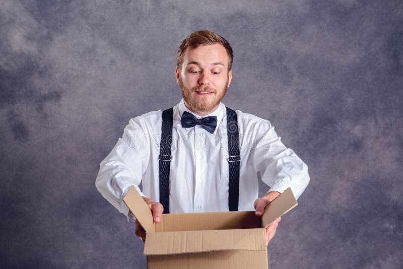 Man opening a package stock image. Image of handsome - 68526115