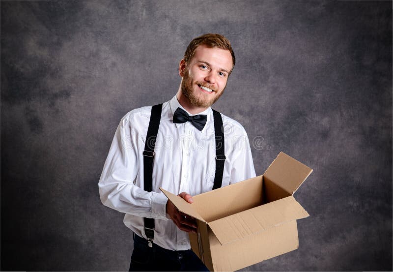 Man opening a package stock photo. Image of surprise - 76686216
