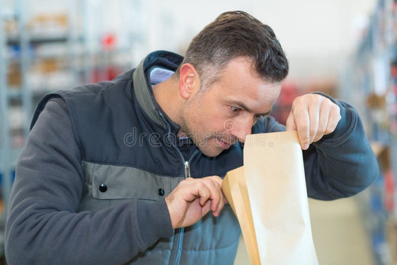 Man Opening Padded Envelope Stock Image - Image of male, mailcarrier ...