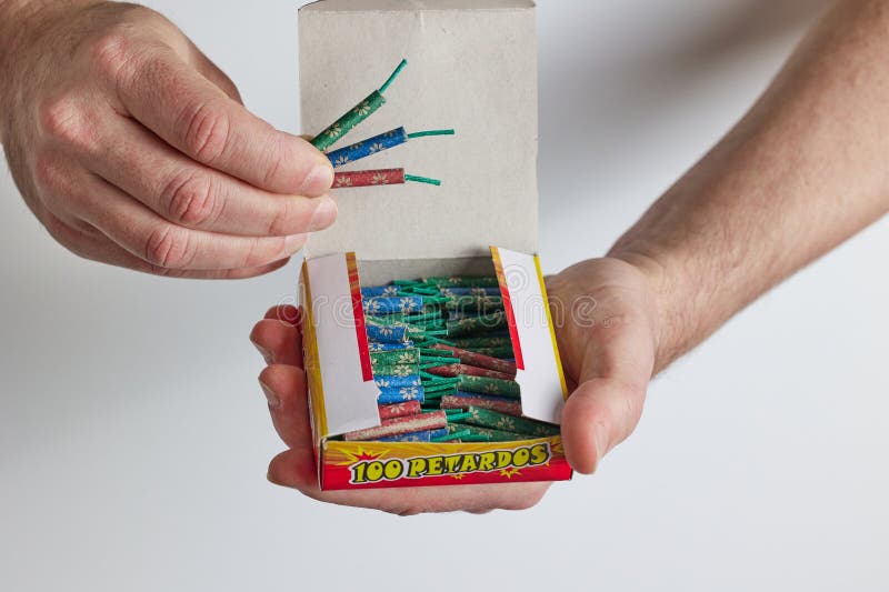 A Man Opens a Box of Firecrackers Stock Photo - Image of firecrackers ...
