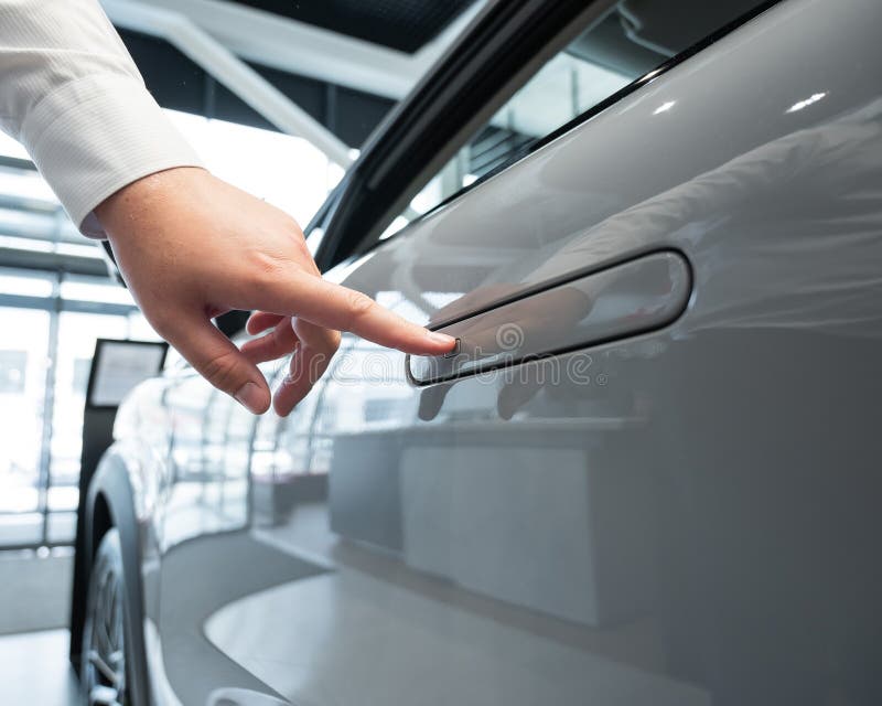 A Man Opens a Car Door with a Fingerprint. Integrated Handle. Stock ...