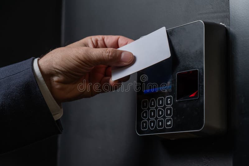 A Man Opens the Door with a Card. Modern Electronic Lock Stock Photo ...