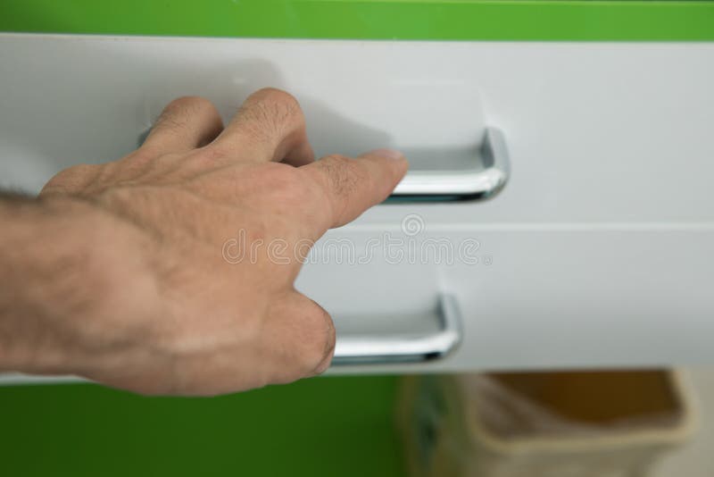 The man opens the rack stock photo. Image of body, handle - 219803120