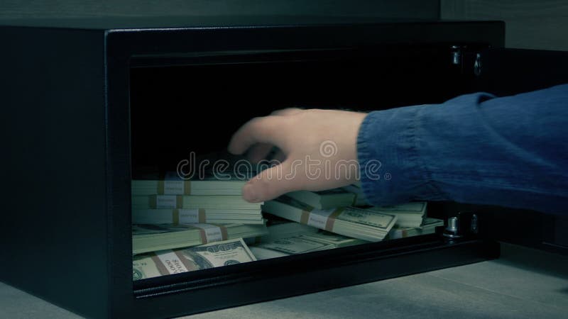 Man Opens Safe and Takes Money Then Locks it Stock Video - Video of ...