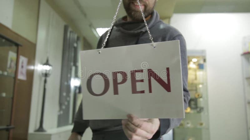Man Opens Store and Flipping Nameplate with Closed Sign Stock Video ...