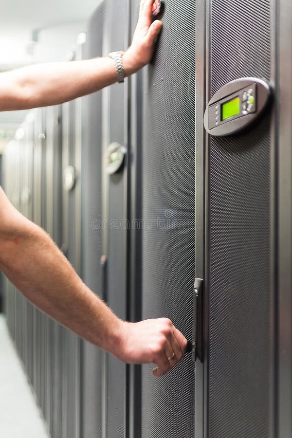 Man Controls the Server Rack Stock Photo - Image of multiple, drive ...