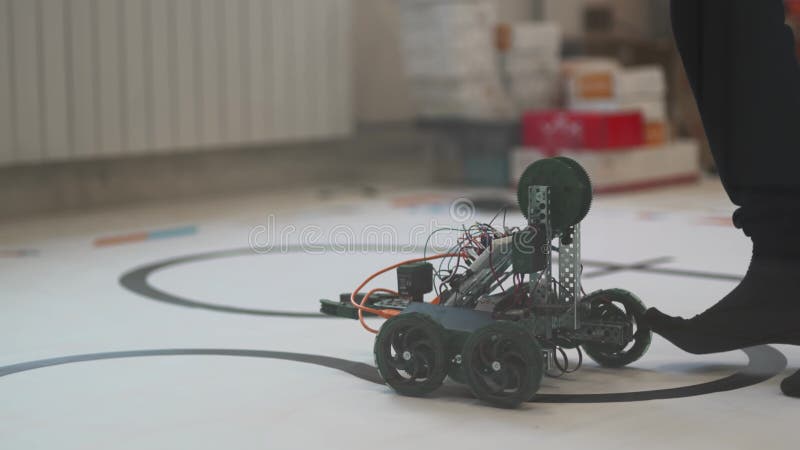 Man Operates Robot by Joystick Conducting Development Test Stock ...