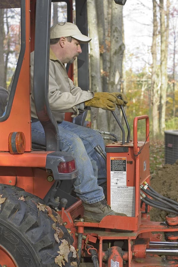 Backhoe Operator stock image. Image of young, digging, equipment - 268665