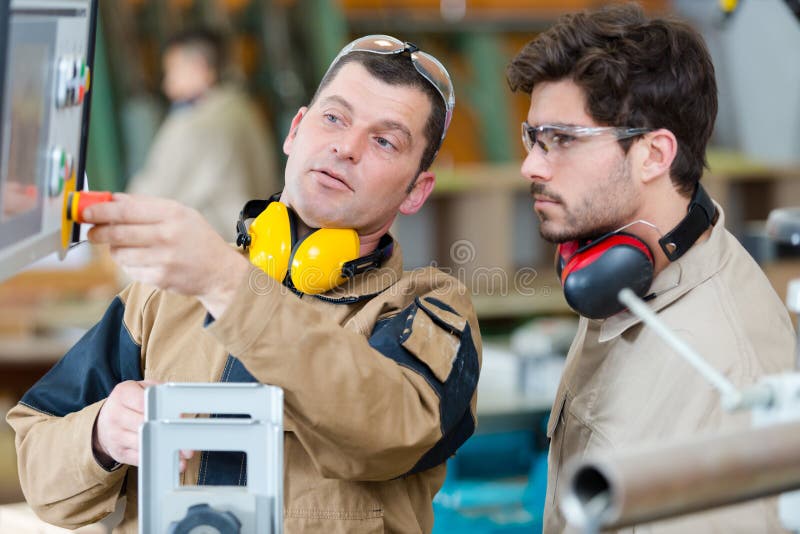 Man Operating Industrial Machine Stock Photo - Image of technical ...