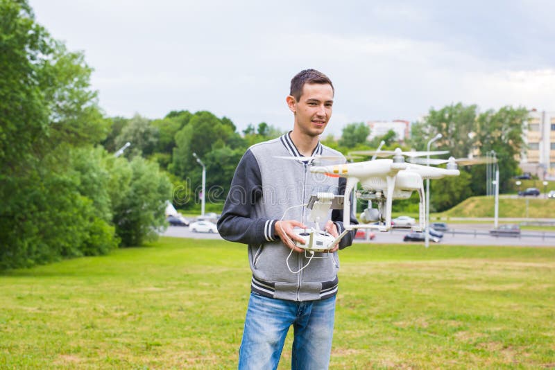 Ufa, Russia. - 6 June 2016 : Man Operating Drone Flying or Hovering by ...