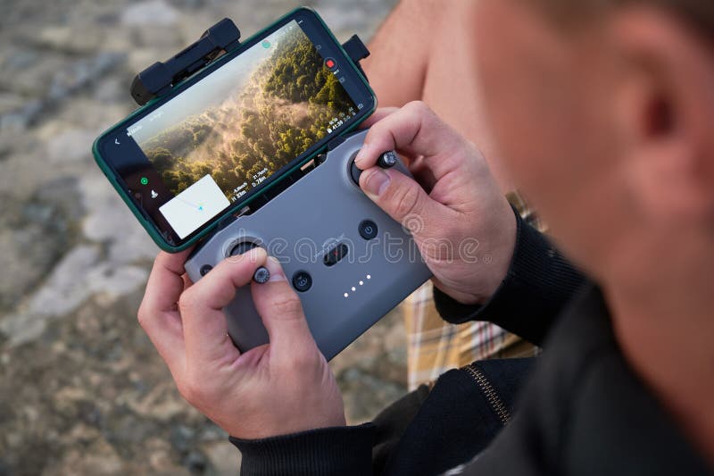 Man Operating Drone Using Remote Controller. Stock Image - Image of ...