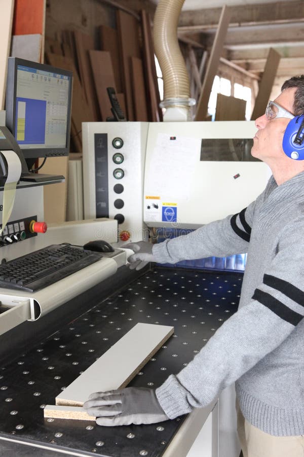 Man operating factory saw stock image. Image of drill - 35908065