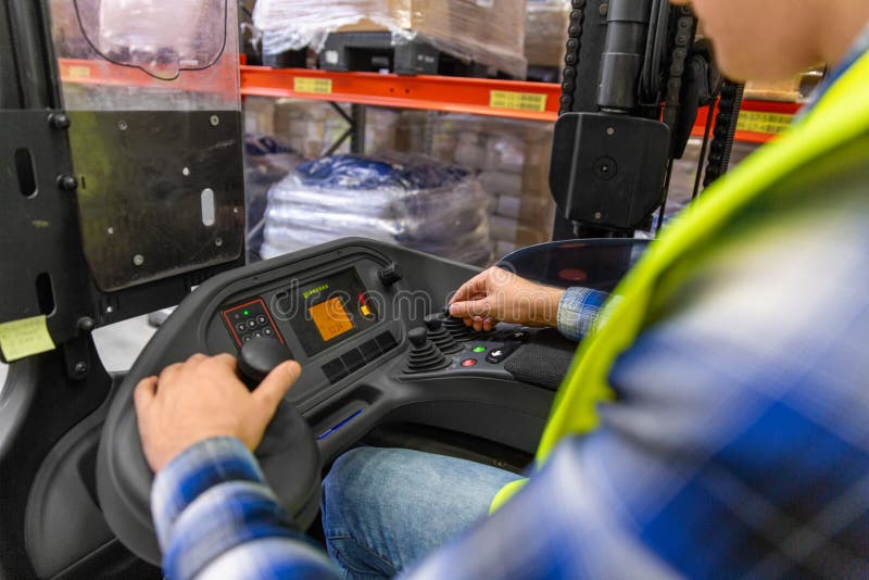 Man Operating Forklift Loader at Warehouse Stock Image - Image of ...