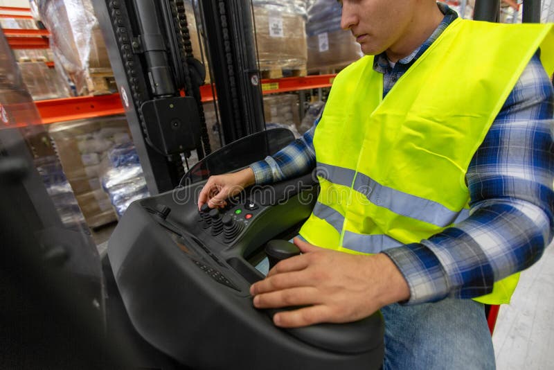 Man Operating Forklift Loader at Warehouse Stock Image - Image of ...