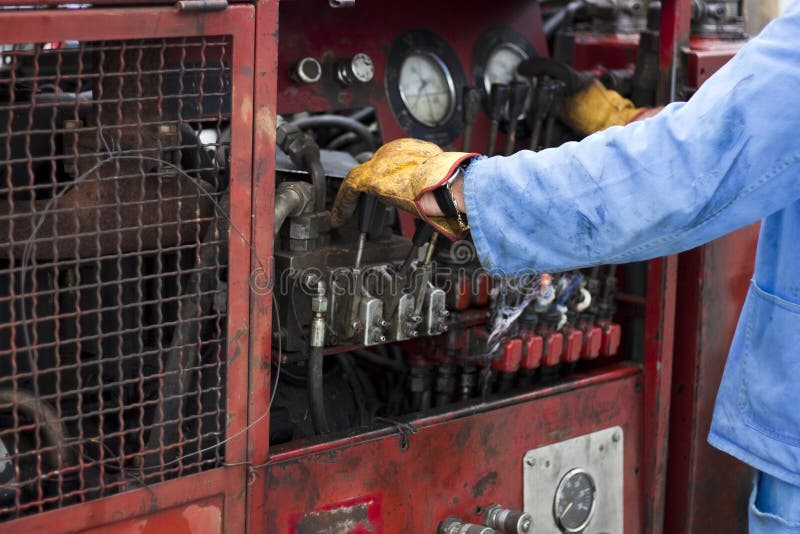 Man operating machine stock image. Image of industrial - 16102919