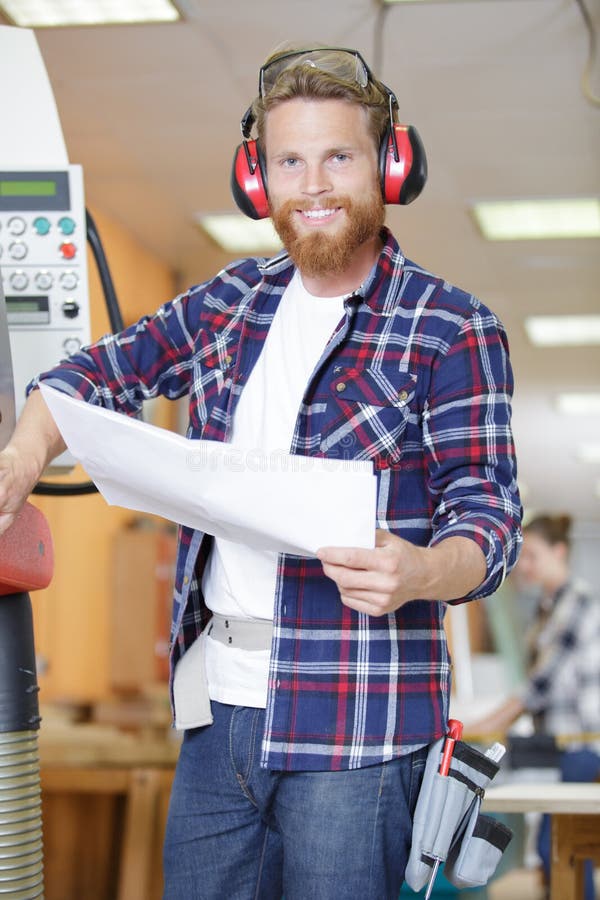 Man Operating Machines in Factory Stock Photo - Image of experienced ...