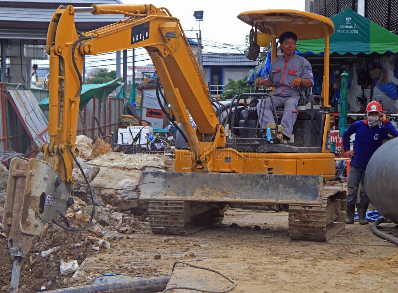 Man is Operating Power Shovel in Bangkok, Thailand Editorial ...