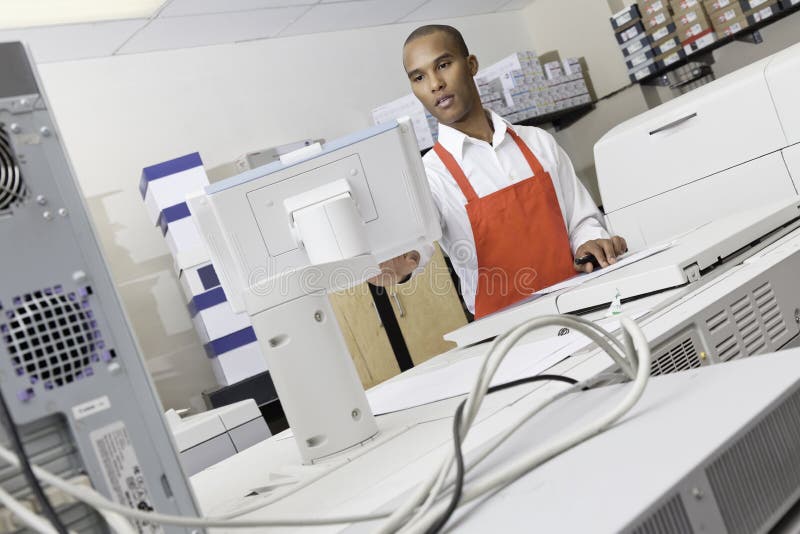 Man Operating Printing Machine at Press Stock Image - Image of indoors ...