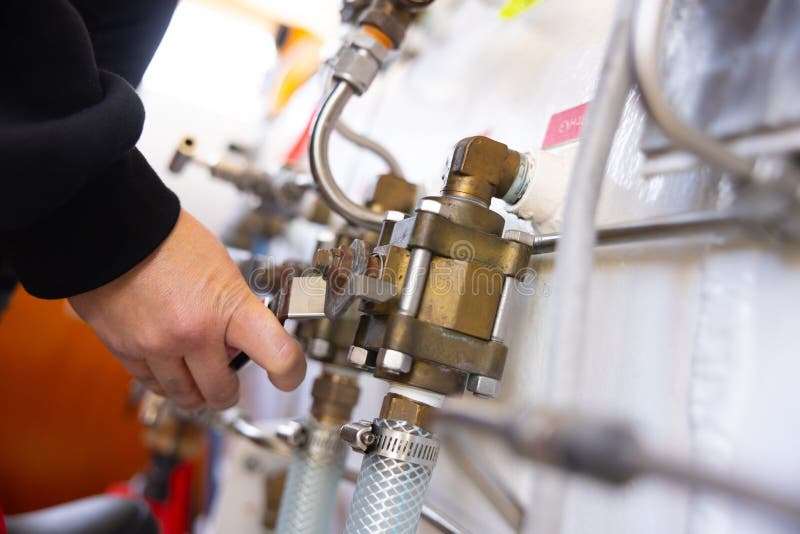 Man Operating Valves on Hyperbaric Chamber Closeup Stock Image - Image ...
