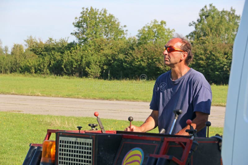 Man Operating Winch Machine Stock Photos - Free & Royalty-Free Stock ...