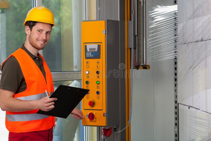 Machine operator at work stock image. Image of manufacturing - 41548721