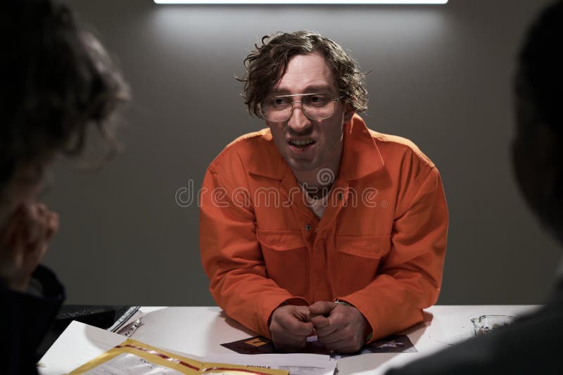 Interrogation Room Scene with Person in Orange Jumpsuit Stock Image ...