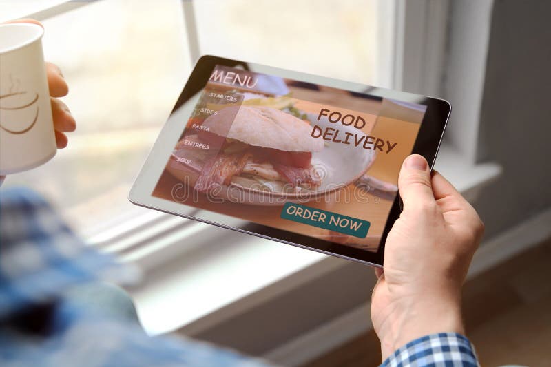 Man is Ordering Food on the Internet Using an App, Restaurant Meals ...