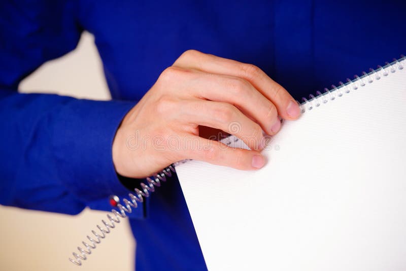 Man Organizing the Documents Using His Hands To Binding Documents Using ...
