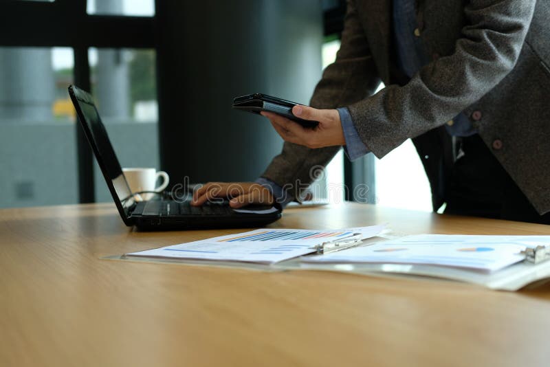 Man Organizing Plan with Smart Phone. Businessman Working with C Stock ...