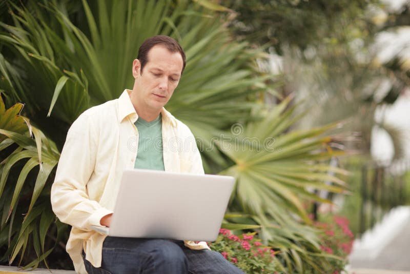 Man Outside with a Notebook Computer Stock Photo - Image of white ...