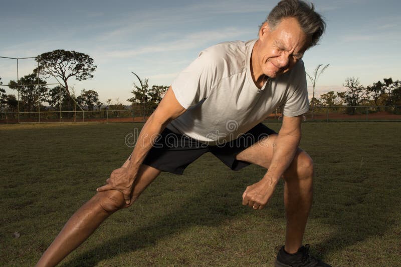 Man Outside Stretching before Working Out Stock Photo - Image of ...