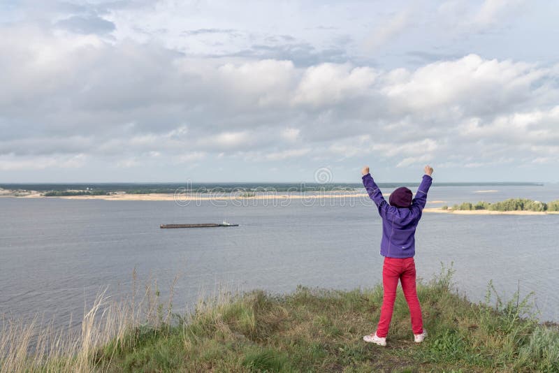 Man Over the Precipice. Man with Arms Raised. Victory. Finish. Win ...