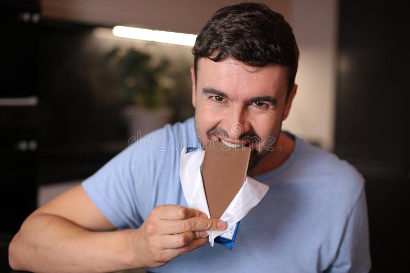 Man Overeating Chocolate at Home Stock Image - Image of person, muscle ...