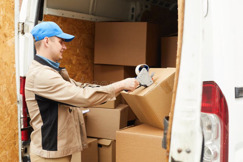 Man packing the parcels stock image. Image of stack - 189105351