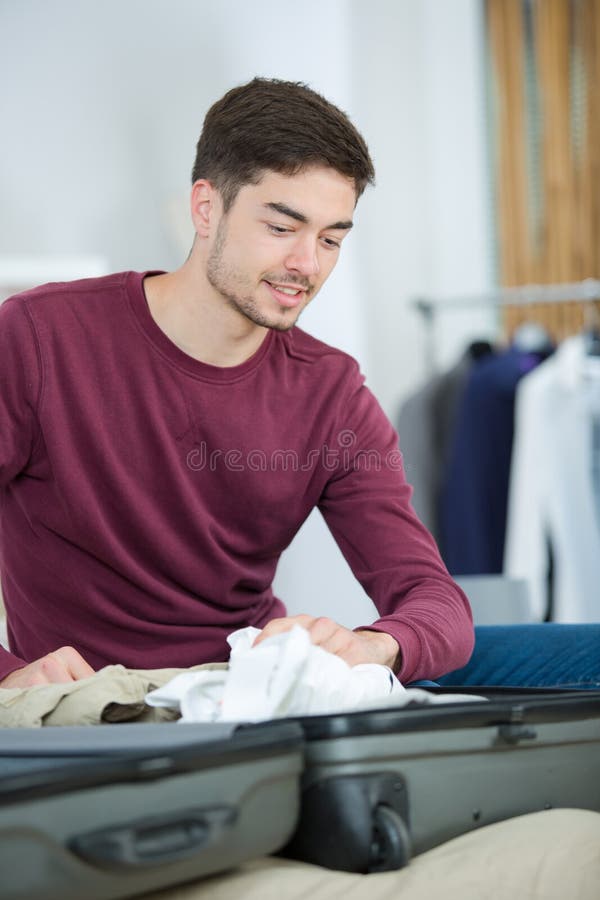 Man Packing Suitcase with To Much Clothes Stock Image - Image of ...