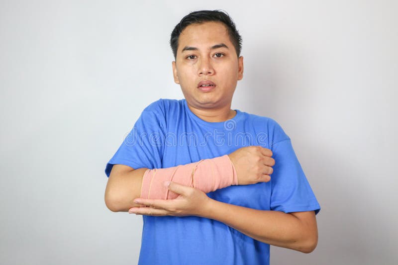 A Man is in Pain because of a Broken Forearm Bone Stock Image - Image ...
