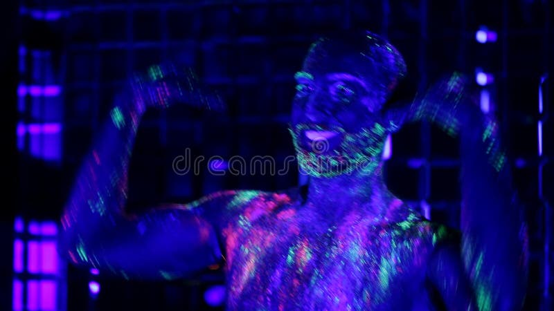 Man Painted Fluorescent Powder Dance in Ultraviolet Light Stock Video ...