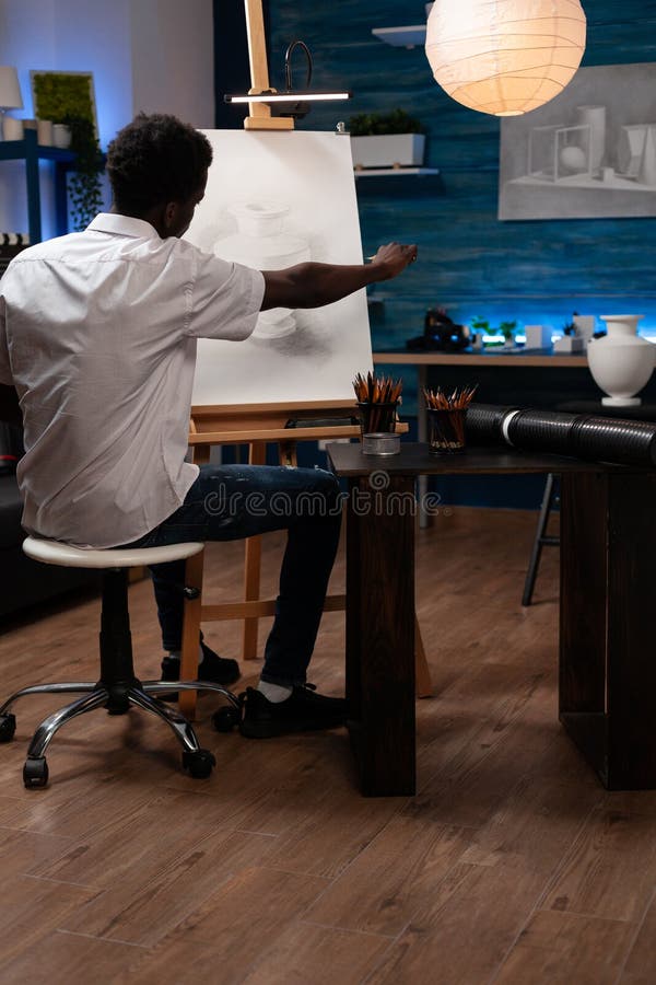 Man Painter Sitting in Front of Canvas Drawing Vase Stock Photo - Image ...
